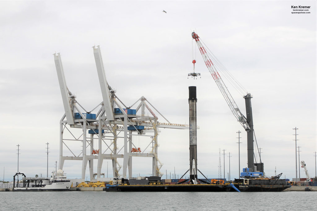 1st Quadruply Launched/Landed SpaceX 1st Stage Booster Craned off ...
