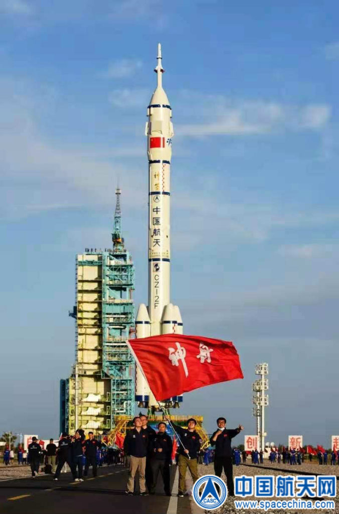China Rolls Out Long March 2F Rocket for Next Human Spaceflight on ...